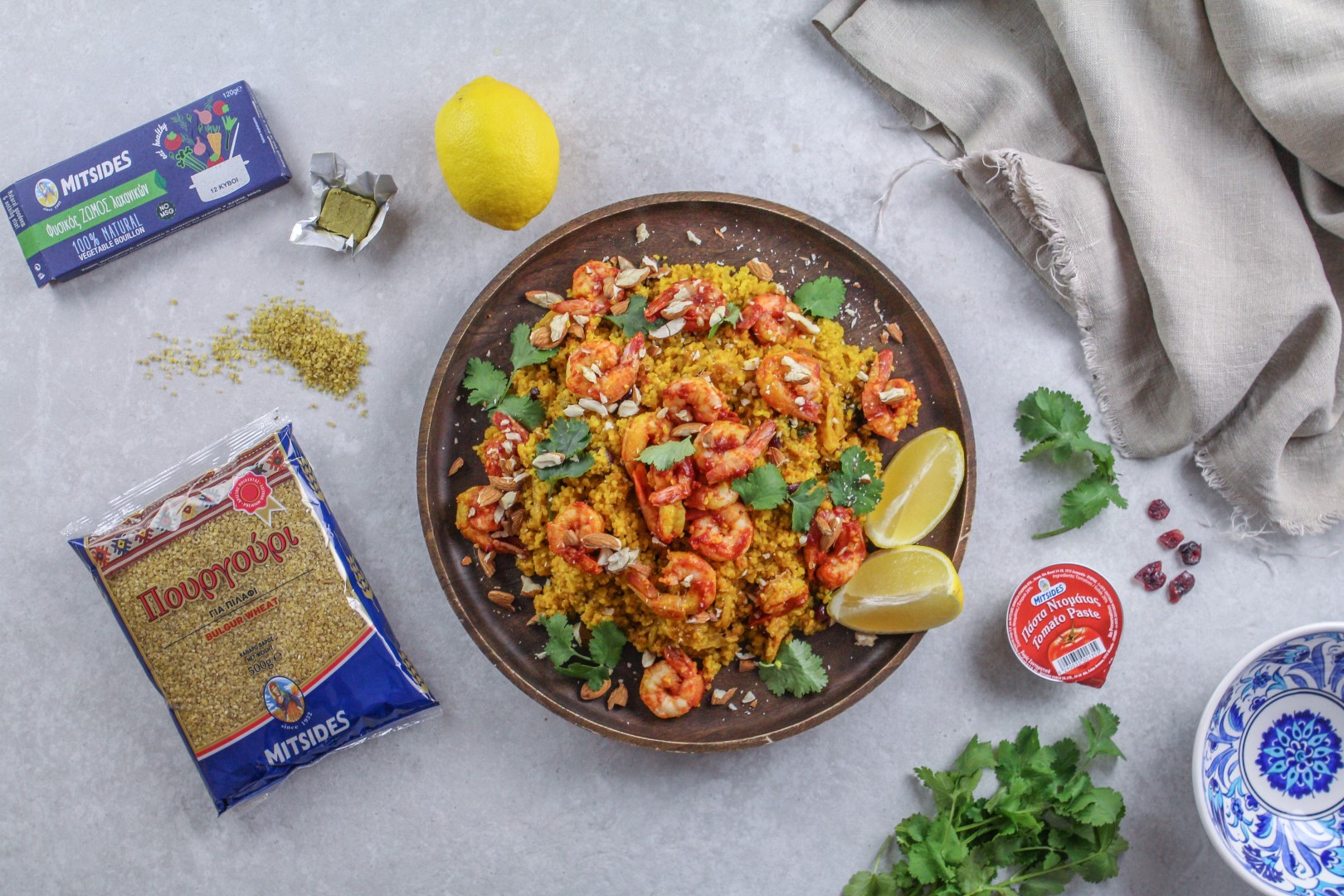 Lemon Bulgur with dried fruits and coriander chilli prawns - Mitsides Group